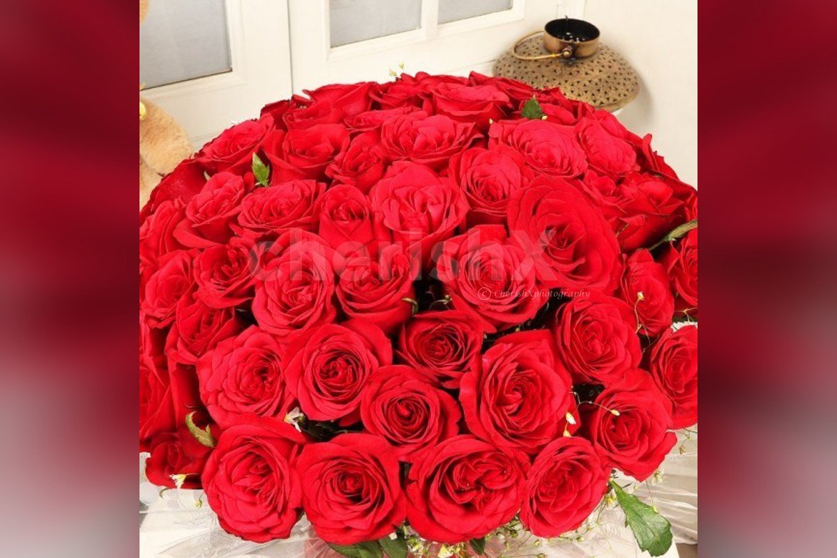 Buy 100 Red Roses grand bouquet Online and get them delivered for free ...