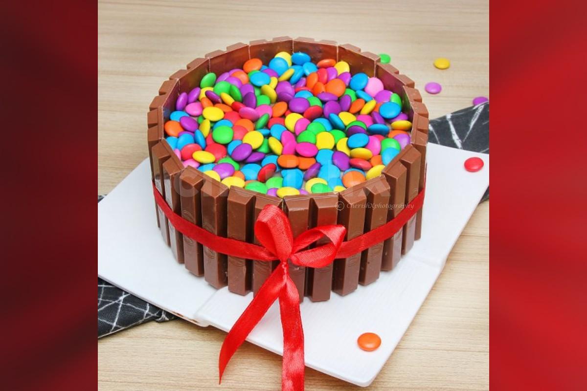 Send a simple 10 Red Rose with Kitkat Gems cake (500 gms) - Free & On ...