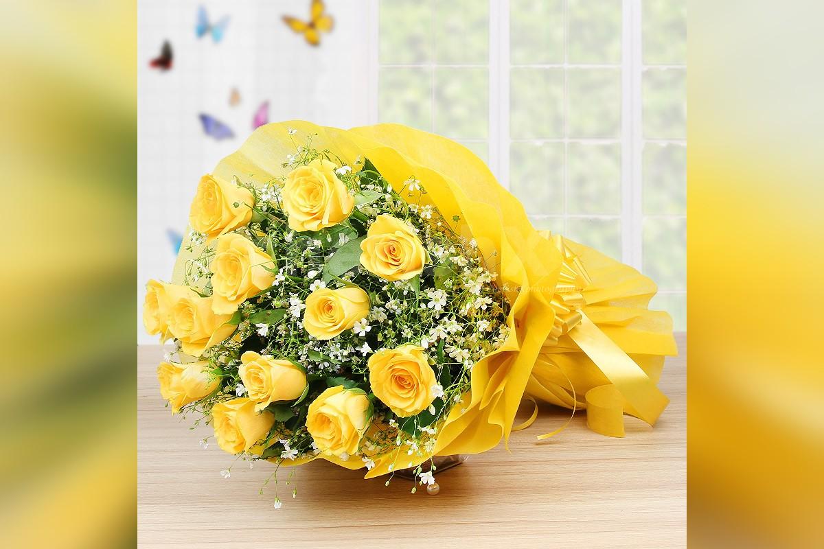 Send a simple 12 Yellow Roses with chocolate truffle cake (500 gms ...