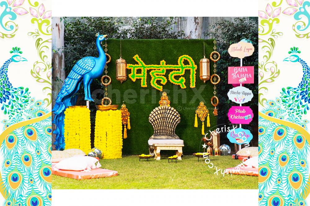 A peacock themed decoration for a mehndi ceremony is a great way to ...