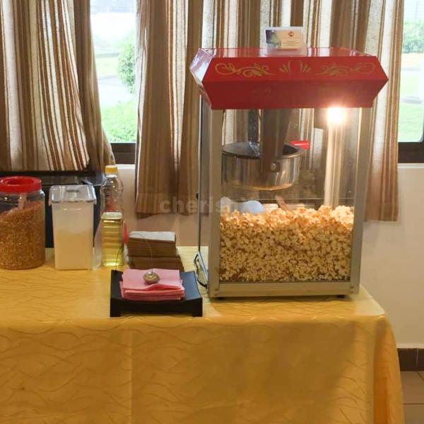 A popcorn counter can offer different flavours and toppings, making it ...