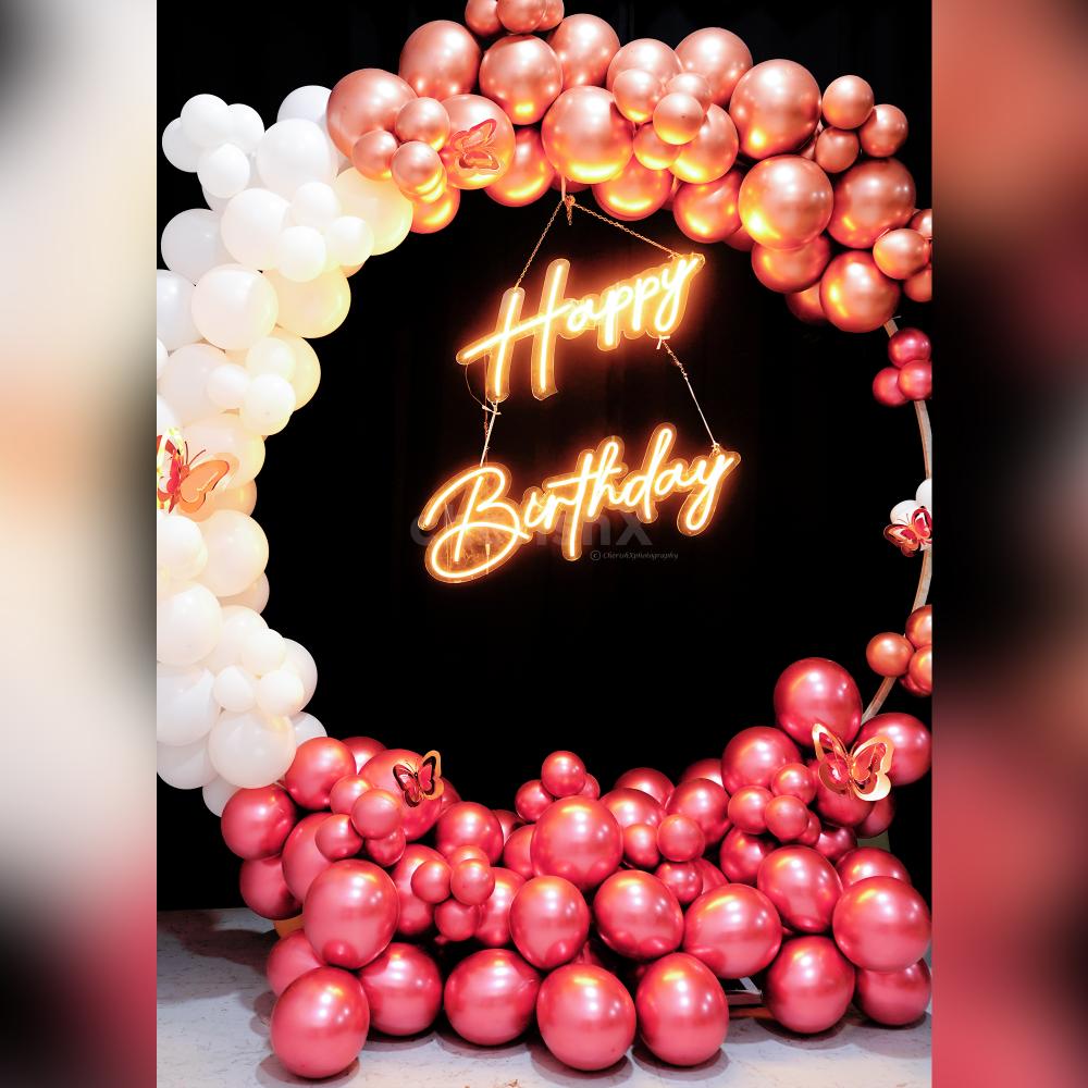 Vintage ring birthday decor with rose gold and white balloons. | Delhi NCR