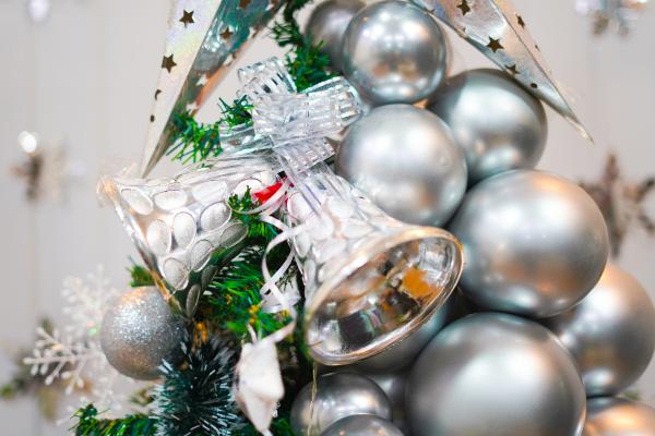 Ring in joy with our Christmas Tree decorations adorned with silver ...